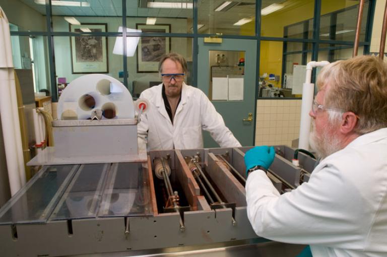 Bruce Cowell and Trevor Carter tint a length of film in the film ...